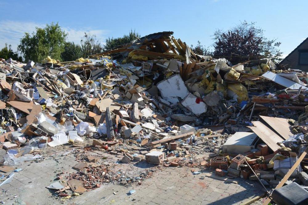 China building collapse: Nine people detained, rescue operation on